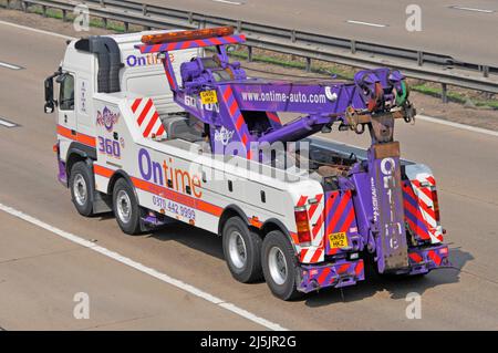 Side back aerial view of lorry truck & articulated trailer loaded with ...