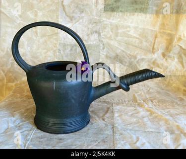 decorative clay mug, crumpled fabric background, handmade, still life ...