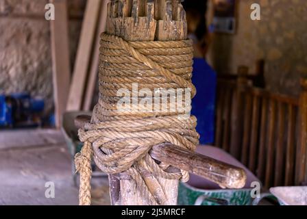Medieval winch for hoisting loads up a tower Stock Photo - Alamy