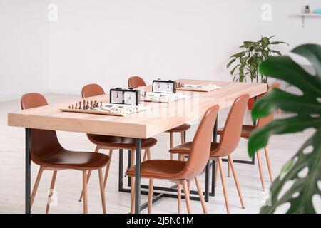Room prepared for chess tournament in club Stock Photo - Alamy