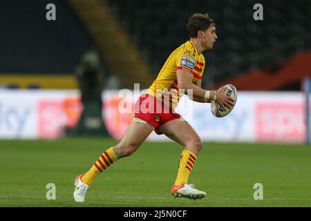 Arthur Mourgue #1 of Catalans Dragons is tackled by Ethan Havard #16 of ...