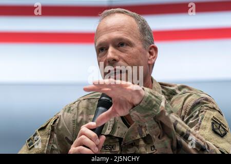 Lt. Gen. John S. Kolasheski, center, commanding general of the V Corps, poses with signed ...