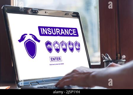 Laptop screen displaying an insurance concept Stock Photo - Alamy
