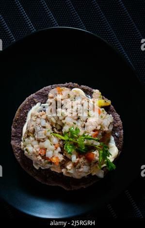 Blue Corn Tortillas. Food made with nixtamalized corn, a staple food in ...
