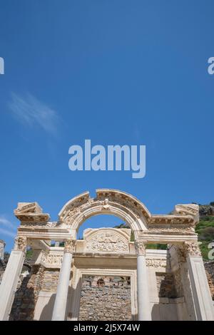 A classic Syrian Arch, part of the balanced facade of Hadrian's temple ...