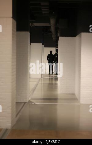 Unusual and interesting interior room with brick columns and a winding ...