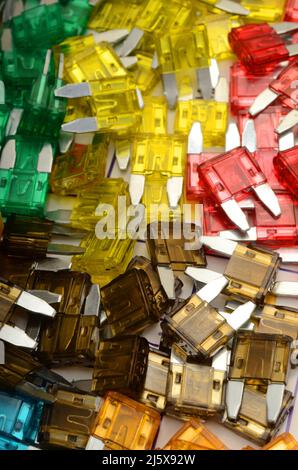 FIRECRACKERS: Color assorted spark plugs for an automobile fuel pump ...