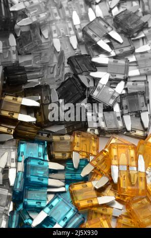 FIRECRACKERS: Color assorted spark plugs for an automobile fuel pump ...
