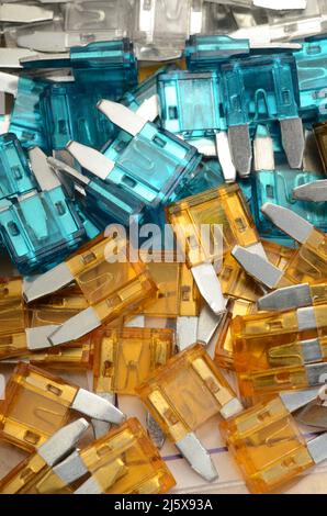 FIRECRACKERS: Color assorted spark plugs for an automobile fuel pump ...
