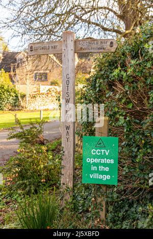 A signpost for the Cotswold Way National Trail in the Cotswold village ...
