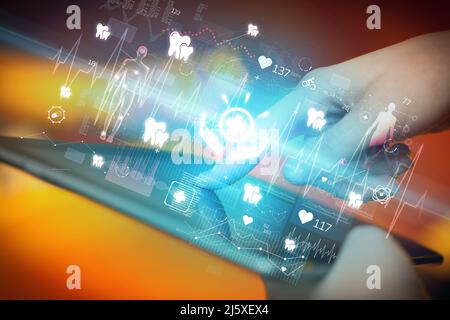 Close-up of a touchscreen with healthcare icons Stock Photo - Alamy