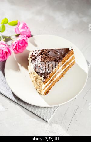 Chocolate cake slice on grey background, top view Stock Photo - Alamy