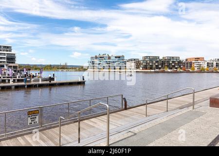 Kingston foreshore in Canberra with lake burley griffin and autumn ...