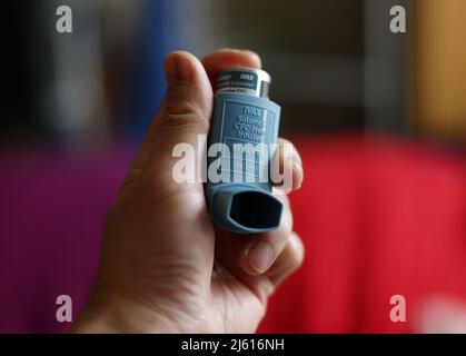 File photo dated 07/01/15 of a person holding an Ivax Reliever inhaler ...