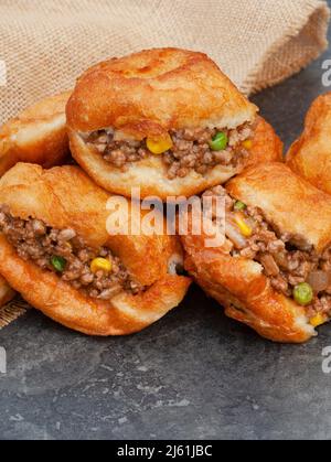 Traditional South African Vetkoek and mince Stock Photo - Alamy