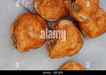 Traditional South African Vetkoek and mince Stock Photo - Alamy