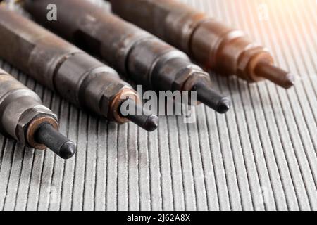 Mechanical injectors from a diesel engine, close-up. Fuel atomization ...