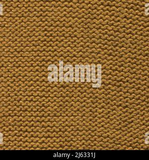 Yellow mustard color knitted fabric texture background Stock Photo - Alamy