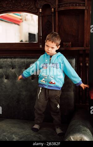 A small child without front teeth laughs merrily Stock Photo - Alamy