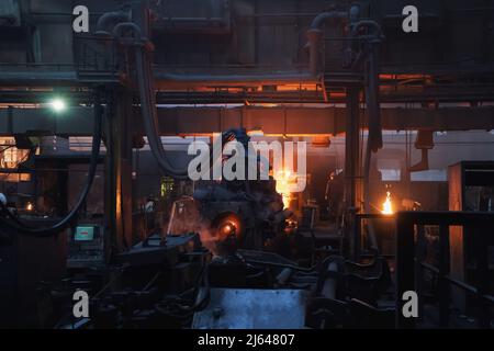Cast iron pipes manufacturing process Stock Photo - Alamy