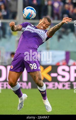 Florence, Italy. 27th Apr, 2022. Isaac Success (Udinese) in aerial duel ...