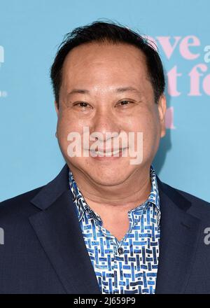 Christopher Chen walking on the red carpet at the premiere of Showtime ...