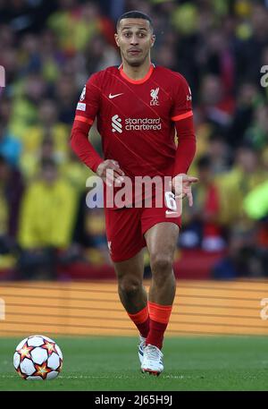 Liverpool, England, 27th April 2022. A young Liverpool fan holds aloft ...