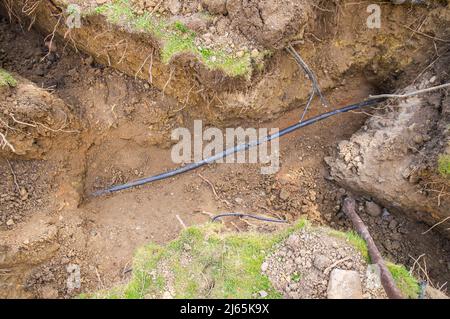 damaged underground cables when digging, snapped, broken power line cable, wiring, broken power ...