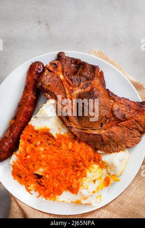 Traditional South African Pap and Wors, sausage with popular maize meal ...
