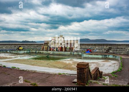 The derelict Lido at Grange Over Sands on the edge of Morecambe Bay in ...