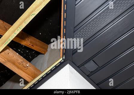 Roof trusses through which the electric cable passes to connect the ...