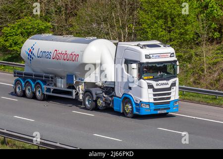 A Lomas Distribution tanker lorry on the M40 motorway, Warwickshire, UK ...