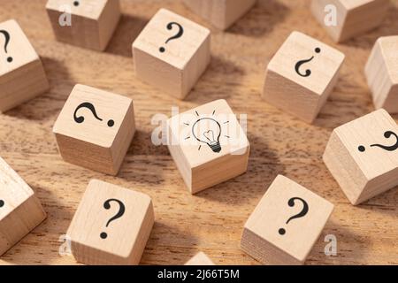 Wooden blocks with symbol of question concept Stock Photo - Alamy