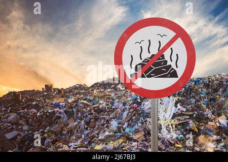 Forbidden dump sign. Landfill with waste in background Stock Photo - Alamy