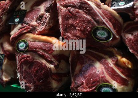 Large pieces of beef on display during the 35th edition of the Salon ...