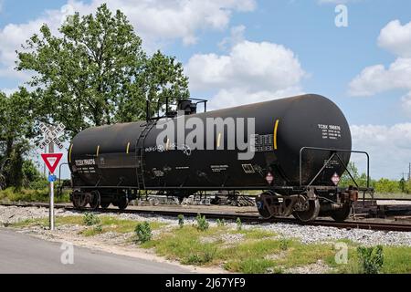 A black railroad tank car on railroad track Stock Photo - Alamy