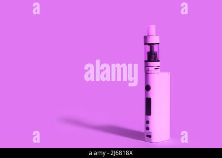 Modern vape mod on color background Stock Photo - Alamy