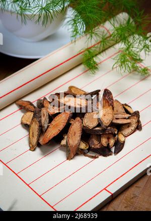 A small amount of radix polygoni multiflori cane Stock Photo - Alamy