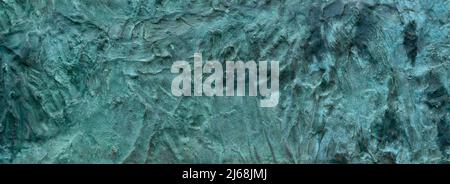 Bronze patina background with turquoise oxidation, textured cracks and ...