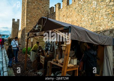 the medieval fair of Montblanc, with children playing as ancient ...