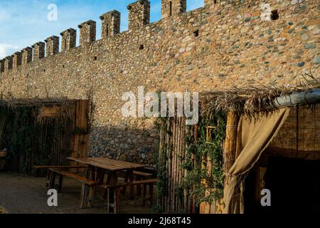 the medieval fair of Montblanc, with children playing as ancient ...