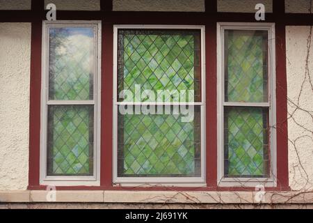 Vintage leaded glass window with diagonal lines and green glass Stock ...
