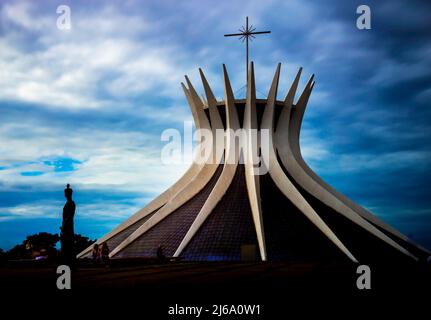 The metropolitan cathedral of brasilia at dusk with its statues stained ...
