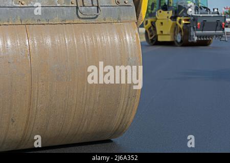Road construction rollers in action Stock Photo - Alamy