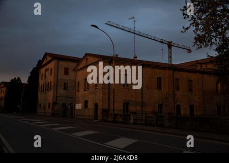Road in the outskirt of an italian town at sunset Stock Photo - Alamy