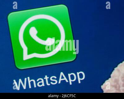 In this photo illustration the WhatsApp logo seen displayed on a ...