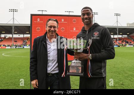 Simon Sadler owner of Blackpool presents the player of the year trophy ...