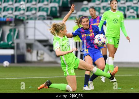 Kathrin Hendrich of Wolfsburg and Mariona Caldentey of Barcelona ...