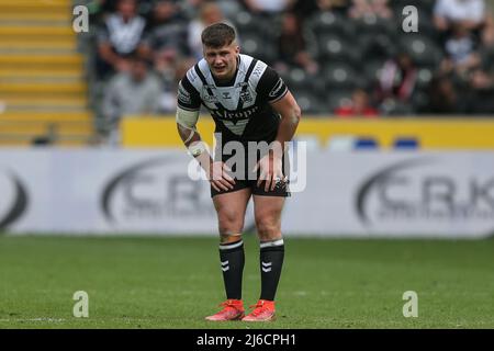 Connor Wynne #23 of Hull FC gets away from Ben Davies #22 of St Helens ...