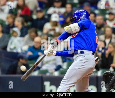 Chicago Cubs right fielder Seiya Suzuki (27) is greeted by center ...